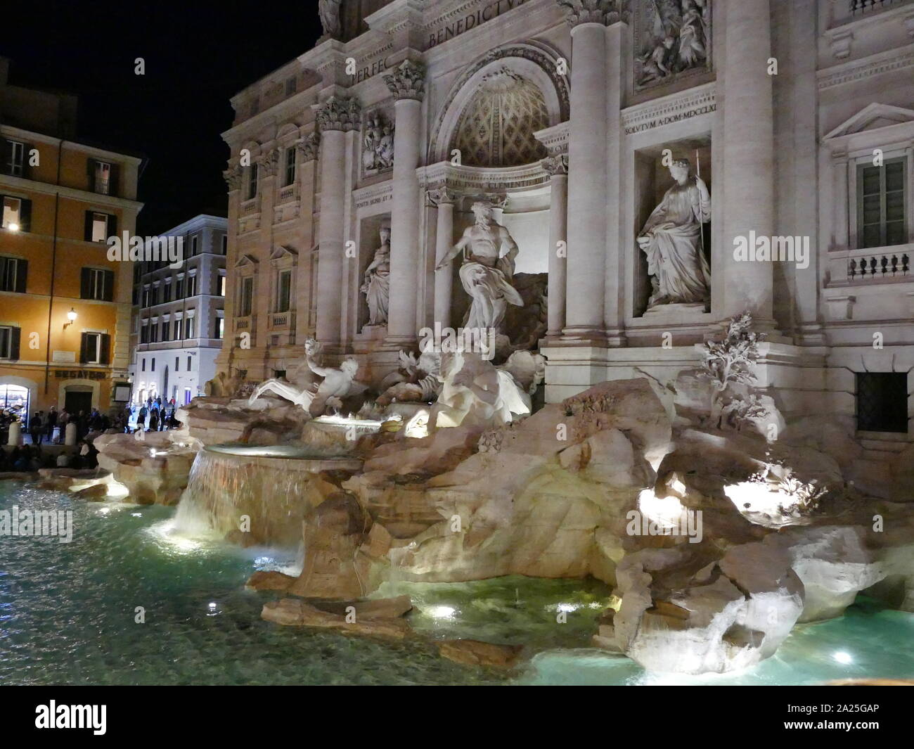 View of the Trevi Fountain at night. The Trevi Fountain is a fountain ...