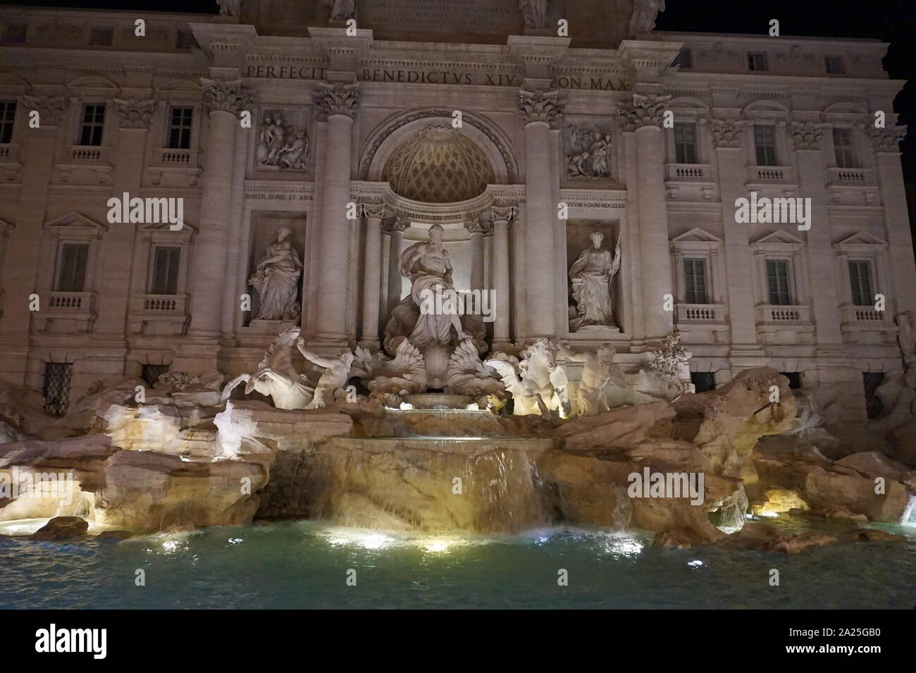 View of the Trevi Fountain at night. The Trevi Fountain is a fountain ...