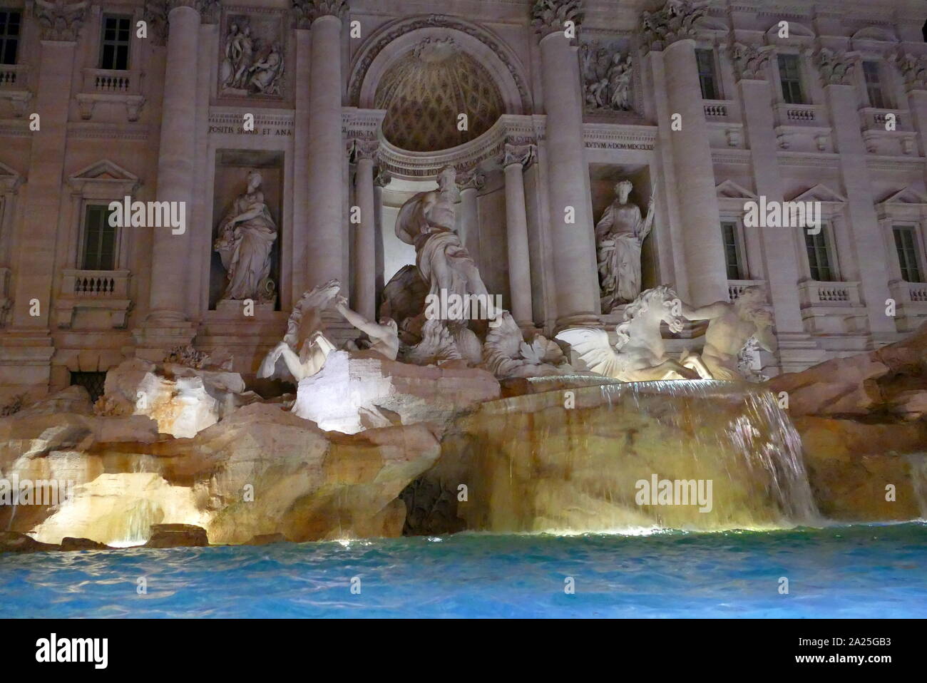 View of the Trevi Fountain at night. The Trevi Fountain is a fountain ...