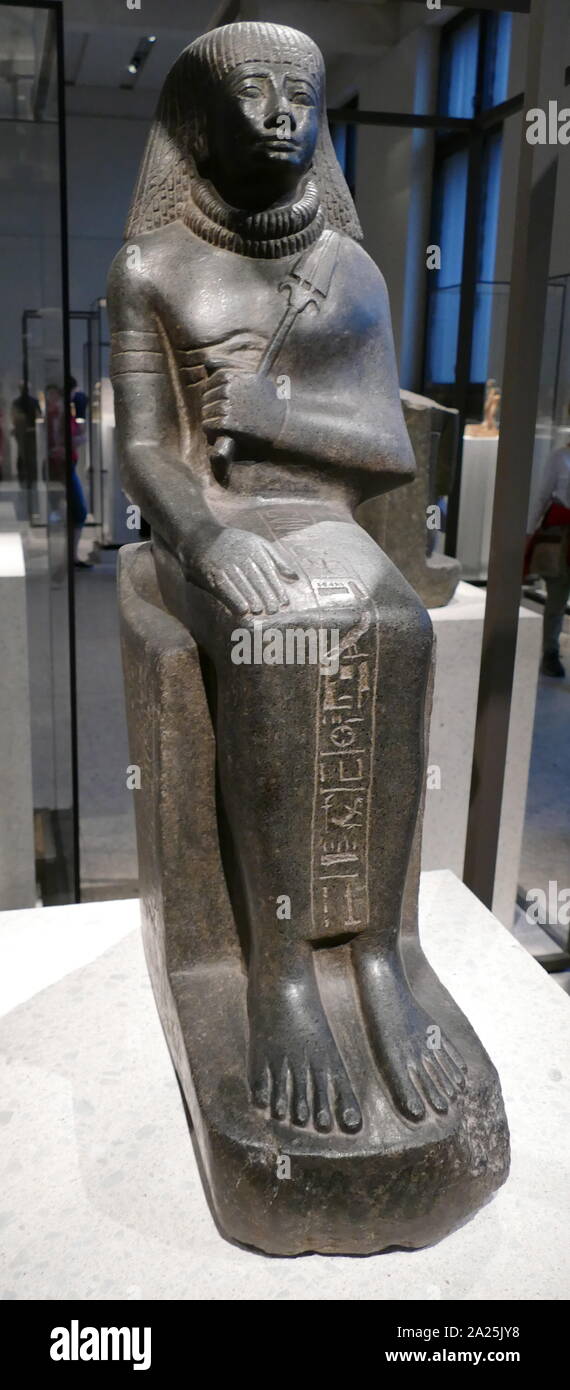 Seated Granodiorite stone statue of Men-techenu, Fan bearer to the King ...