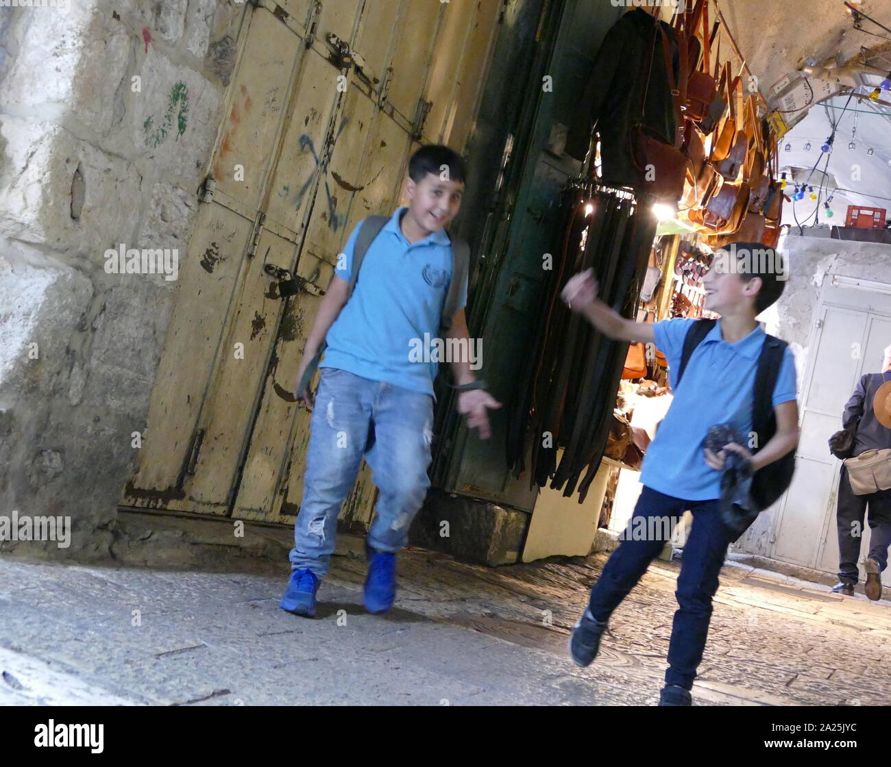 Arab Children going on their way to school in the old city of Jerusalem ...