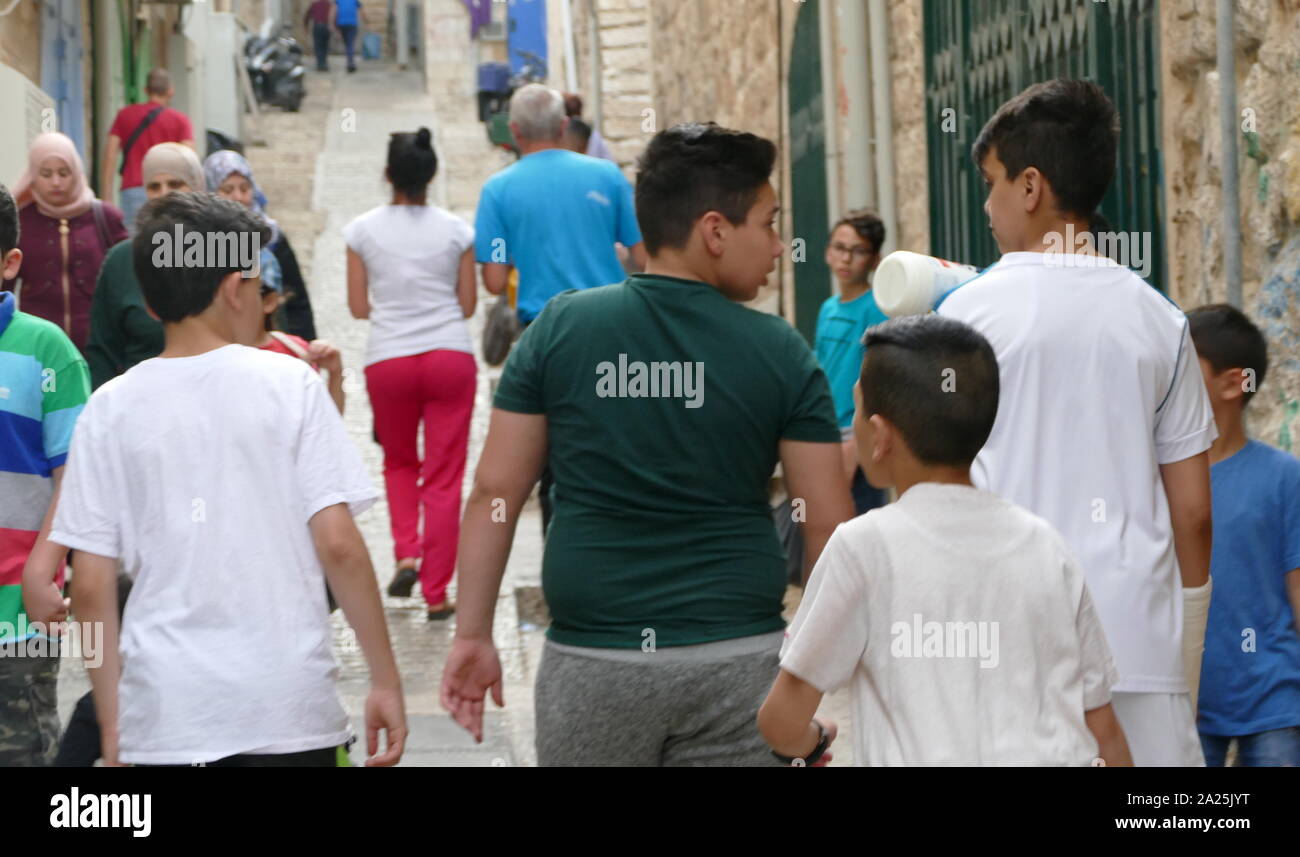 Arab Children going on their way to school in the old city of Jerusalem ...