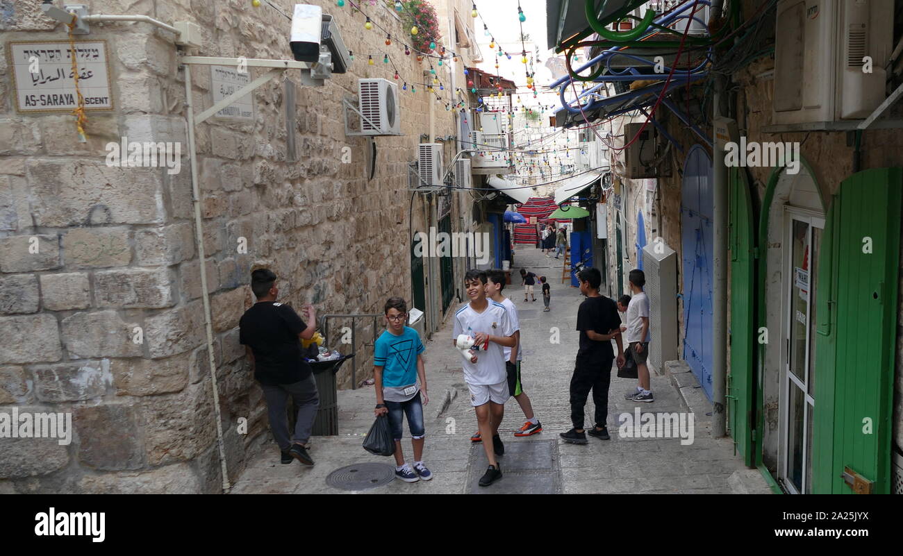 Arab Children going on their way to school in the old city of Jerusalem ...