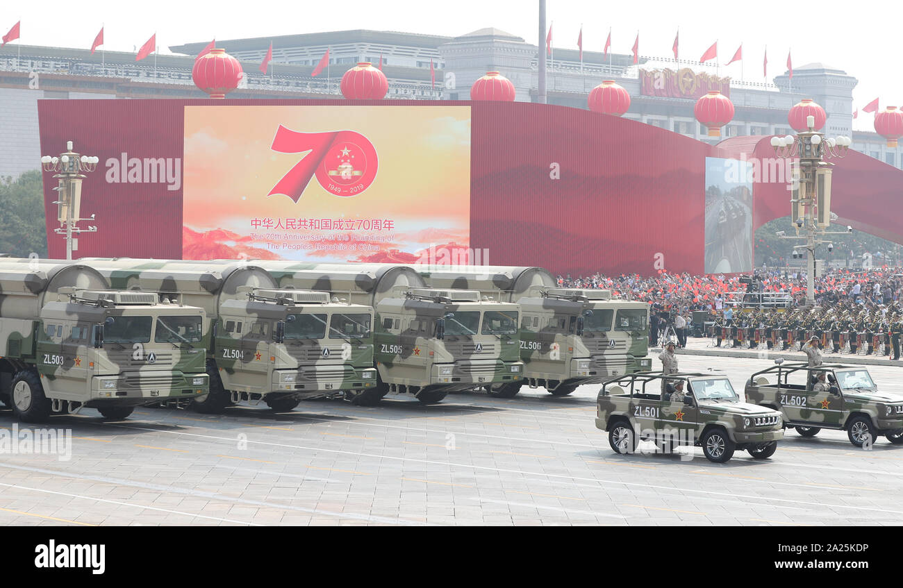 Beijing, China. 1st Oct, 2019. A formation of Dongfeng-31AG missiles ...