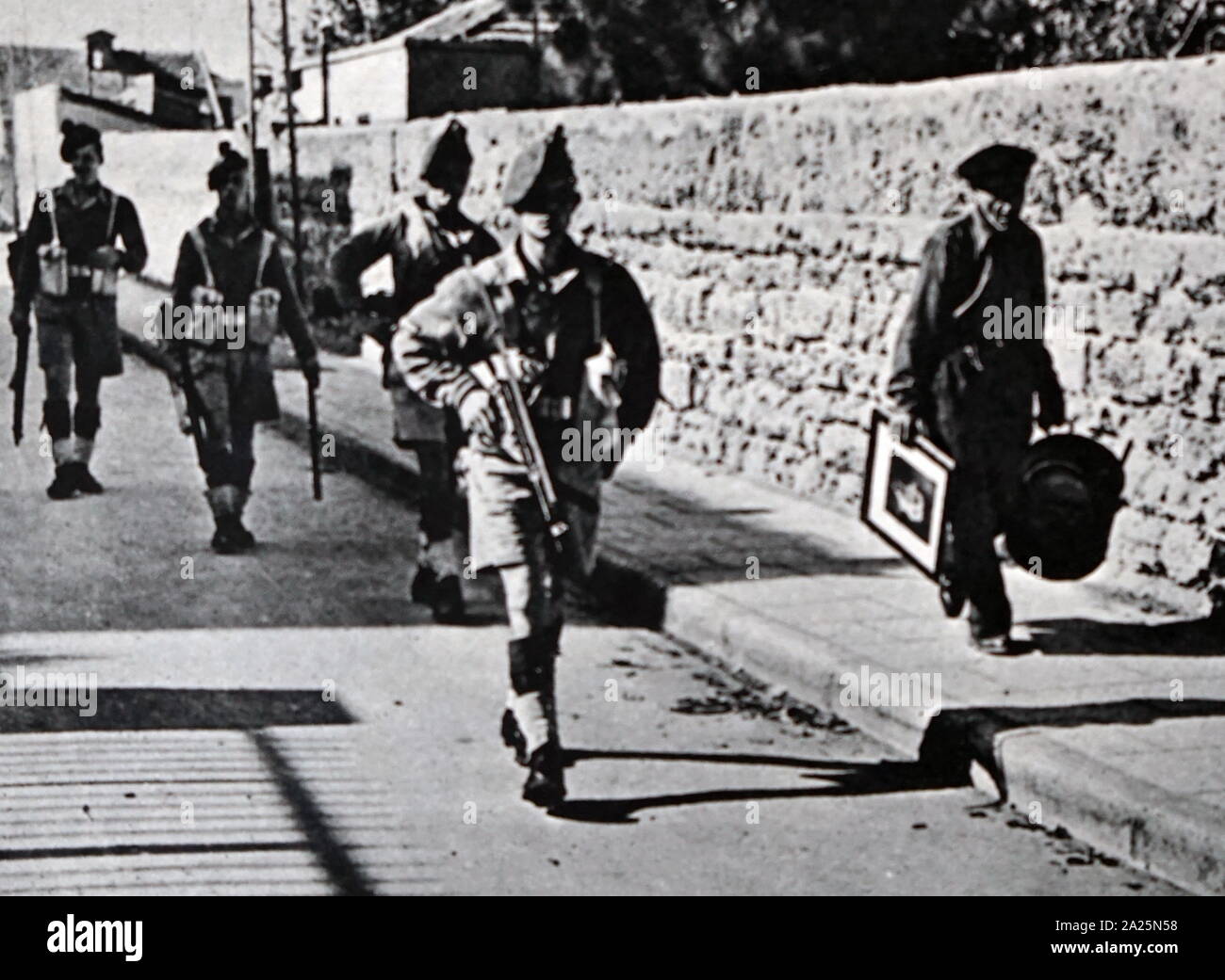 Photograph of a Jewish man moving his possessions from Jaffa to Tel ...