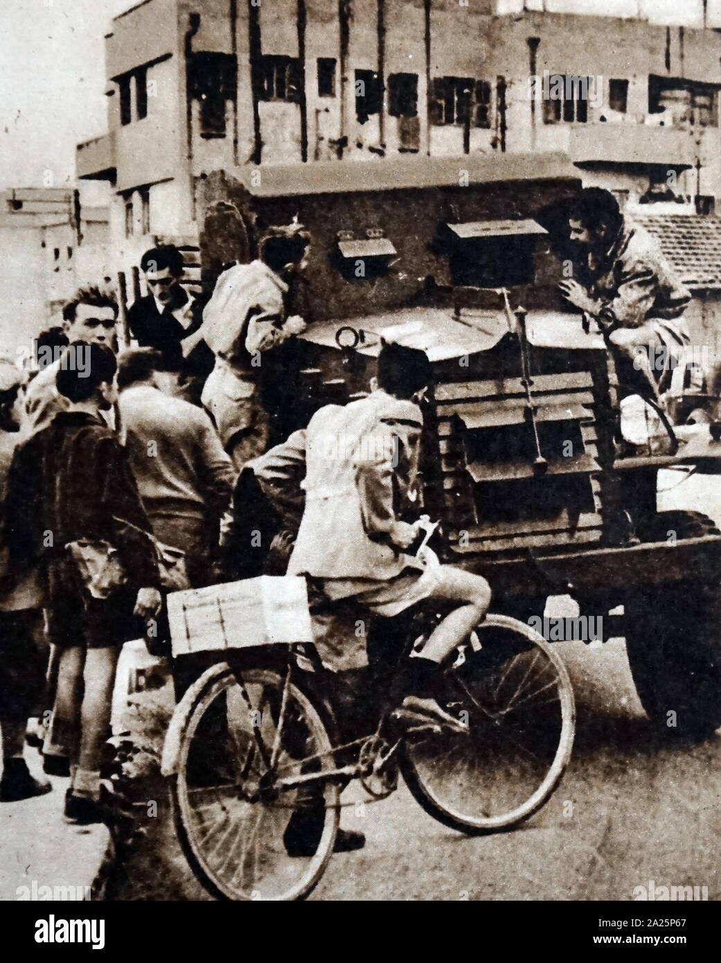 Photograph of young jewish men inspecting a truck fitted with ...
