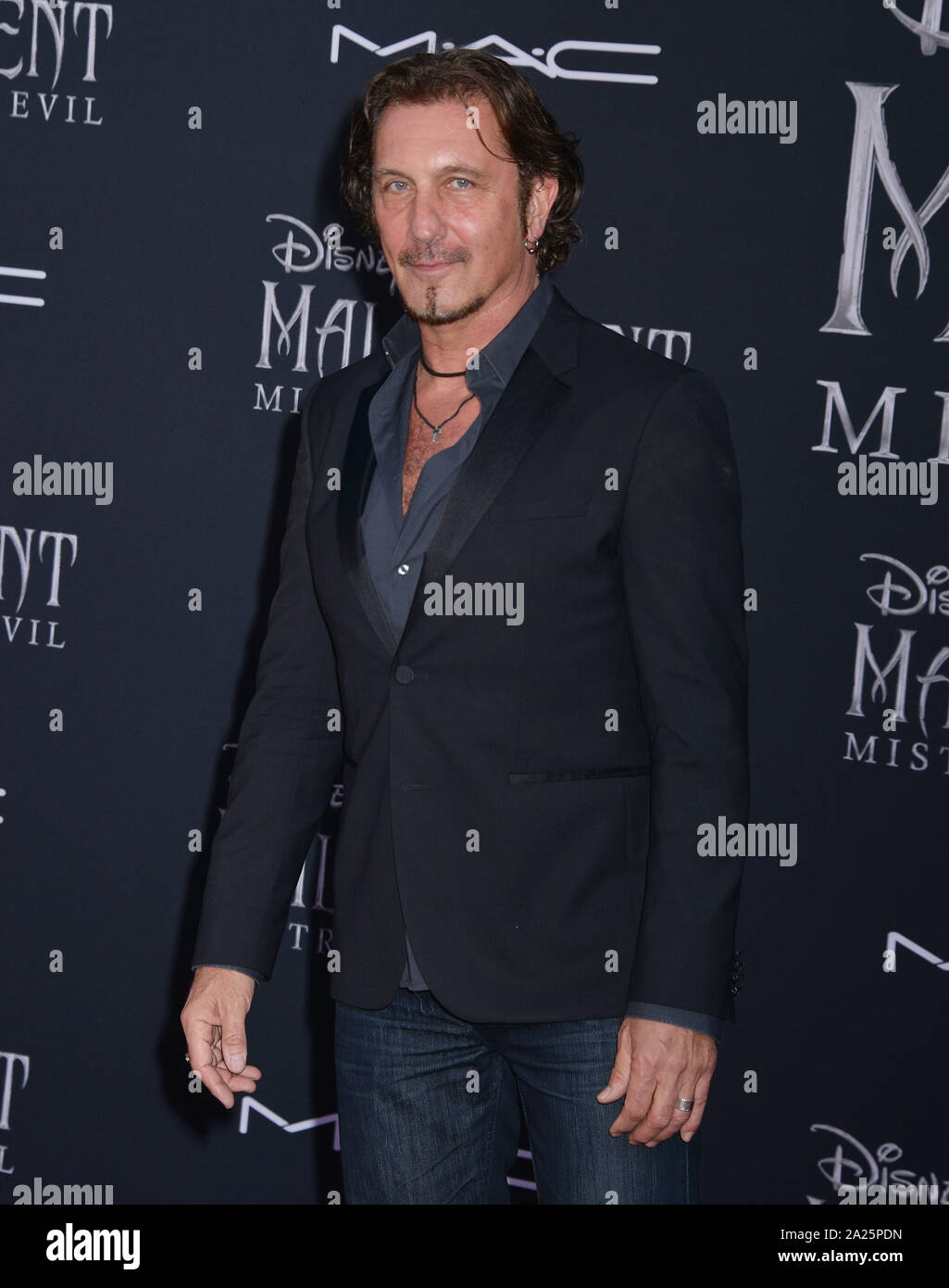 Patrick tatopoulos attends the world premiere of disneys maleficent hi ...