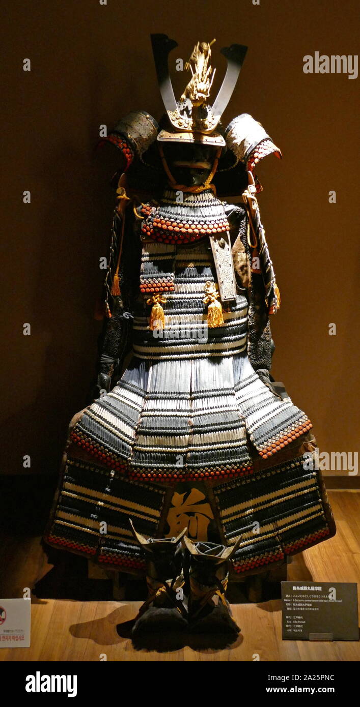 17th century Japanese samurai armour. Showing helmet and full tunic ...