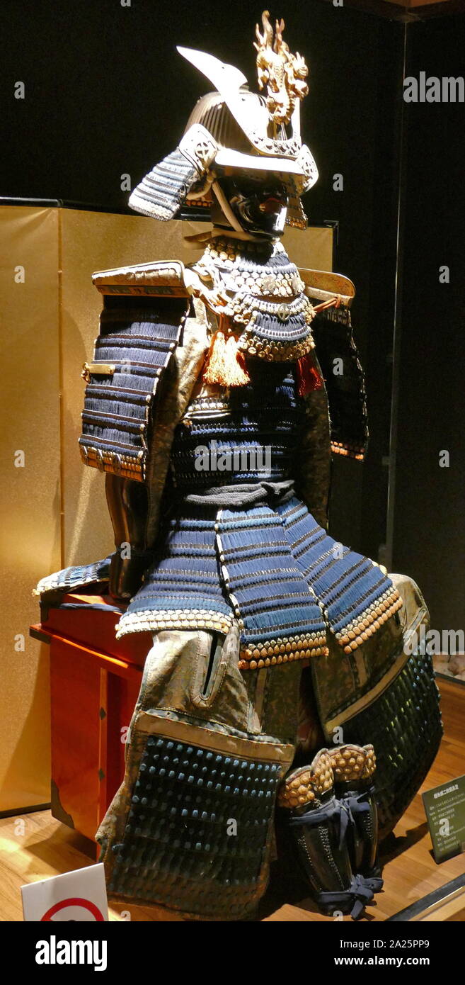 17th century Japanese samurai armour. Showing helmet and full tunic ...