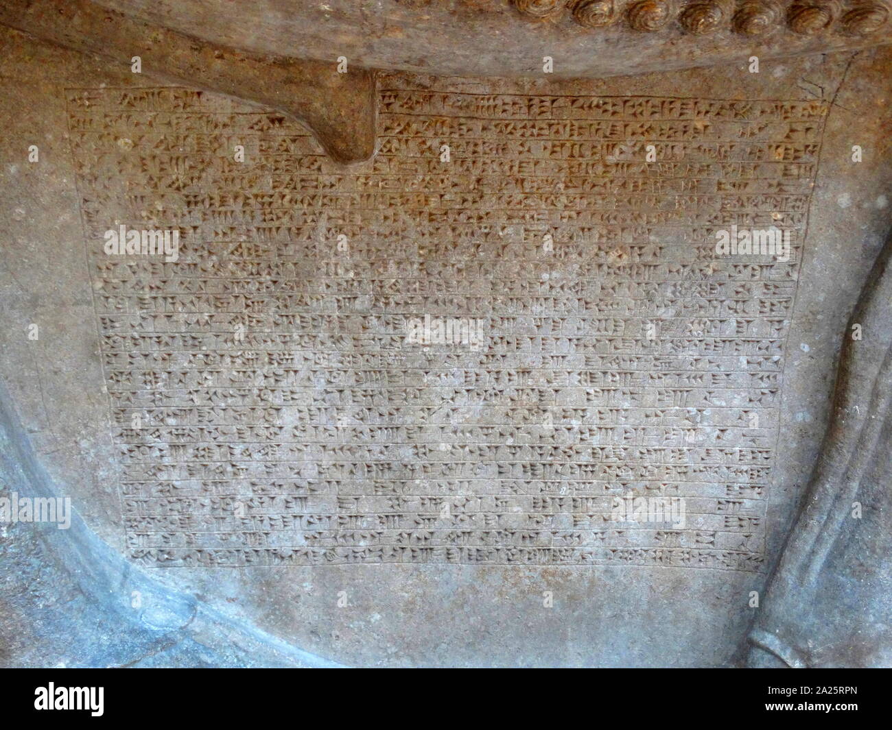 Cuneiform script on a Human-headed winged bull from Sargon II's palace ...
