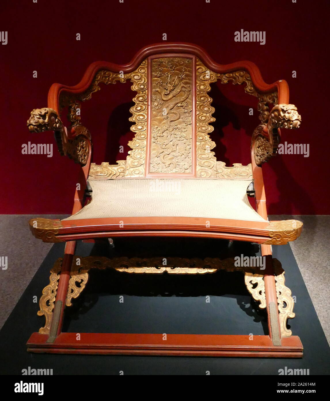 Red lacquered framed folding throne, with gold lacquered cloud, dragon ...