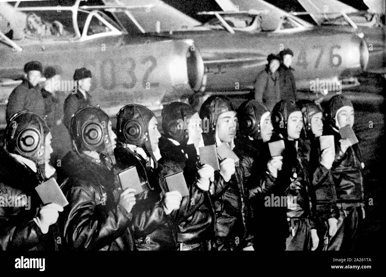 Chinese Air Force pilots carrying the quotations of Chairman Mao. 1966 ...