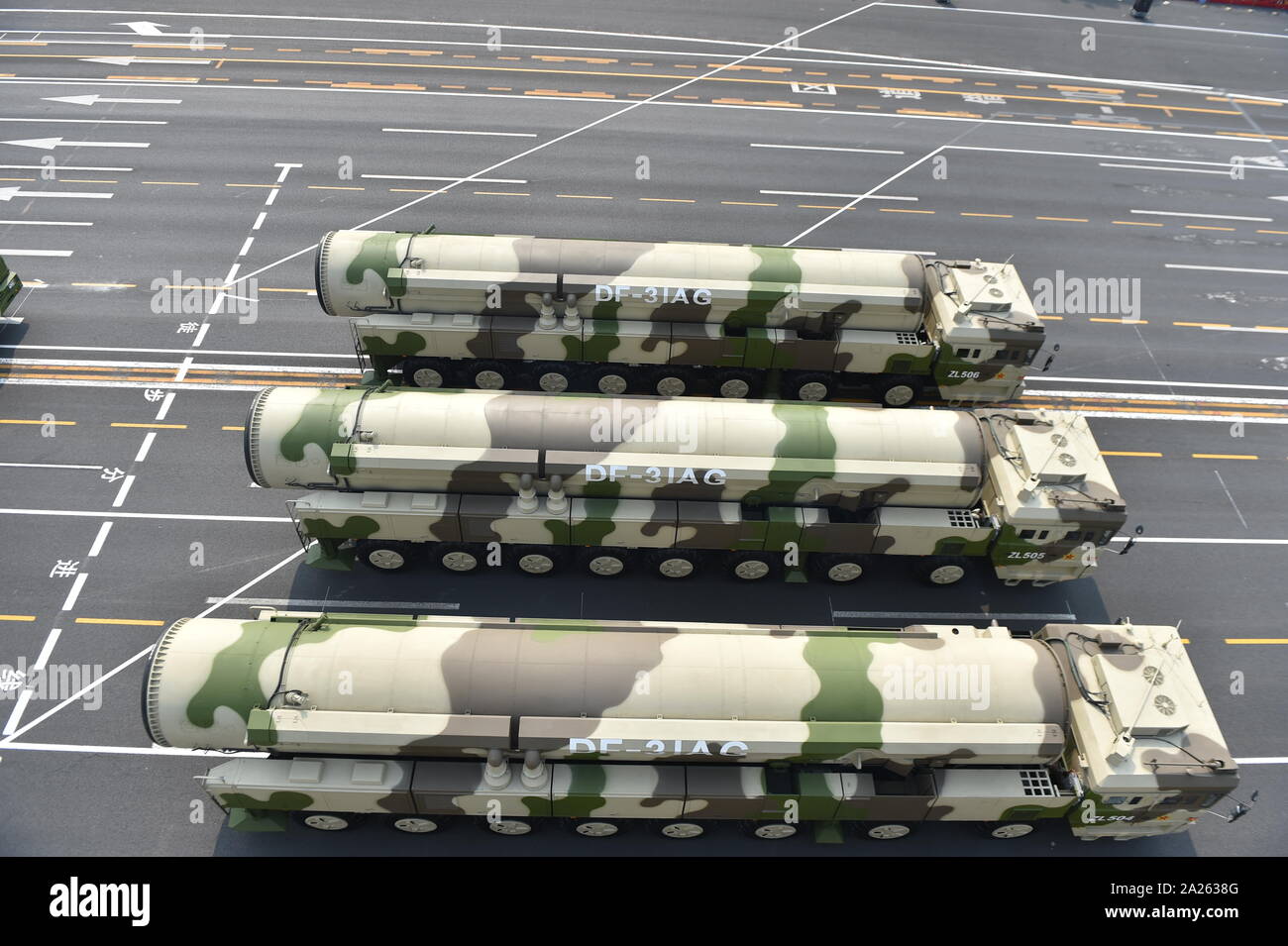 Beijing, China. 1st Oct, 2019. A formation of Dongfeng-31AG missiles ...