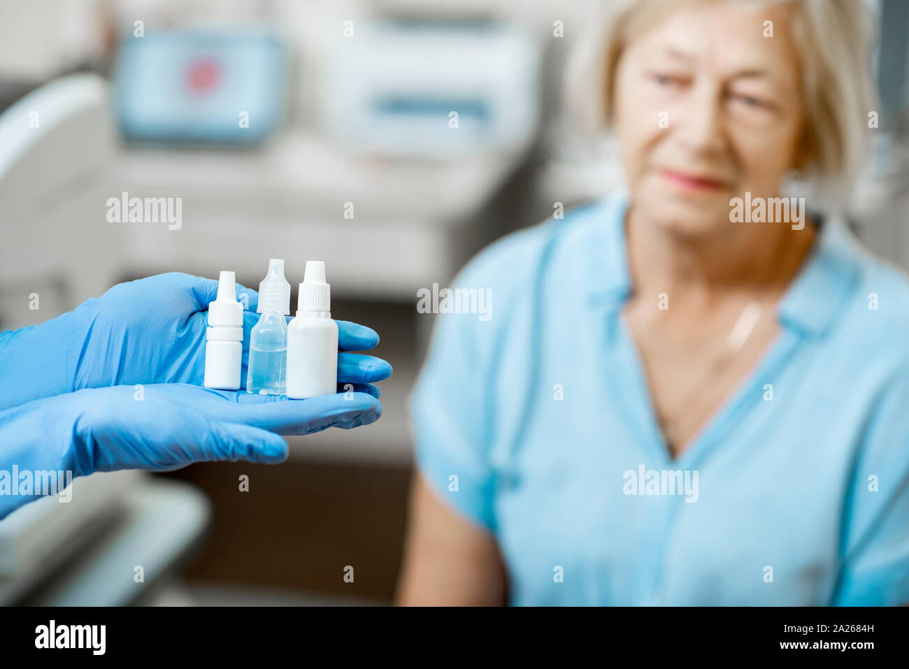 Eye drop elderly hi-res stock photography and images - Alamy