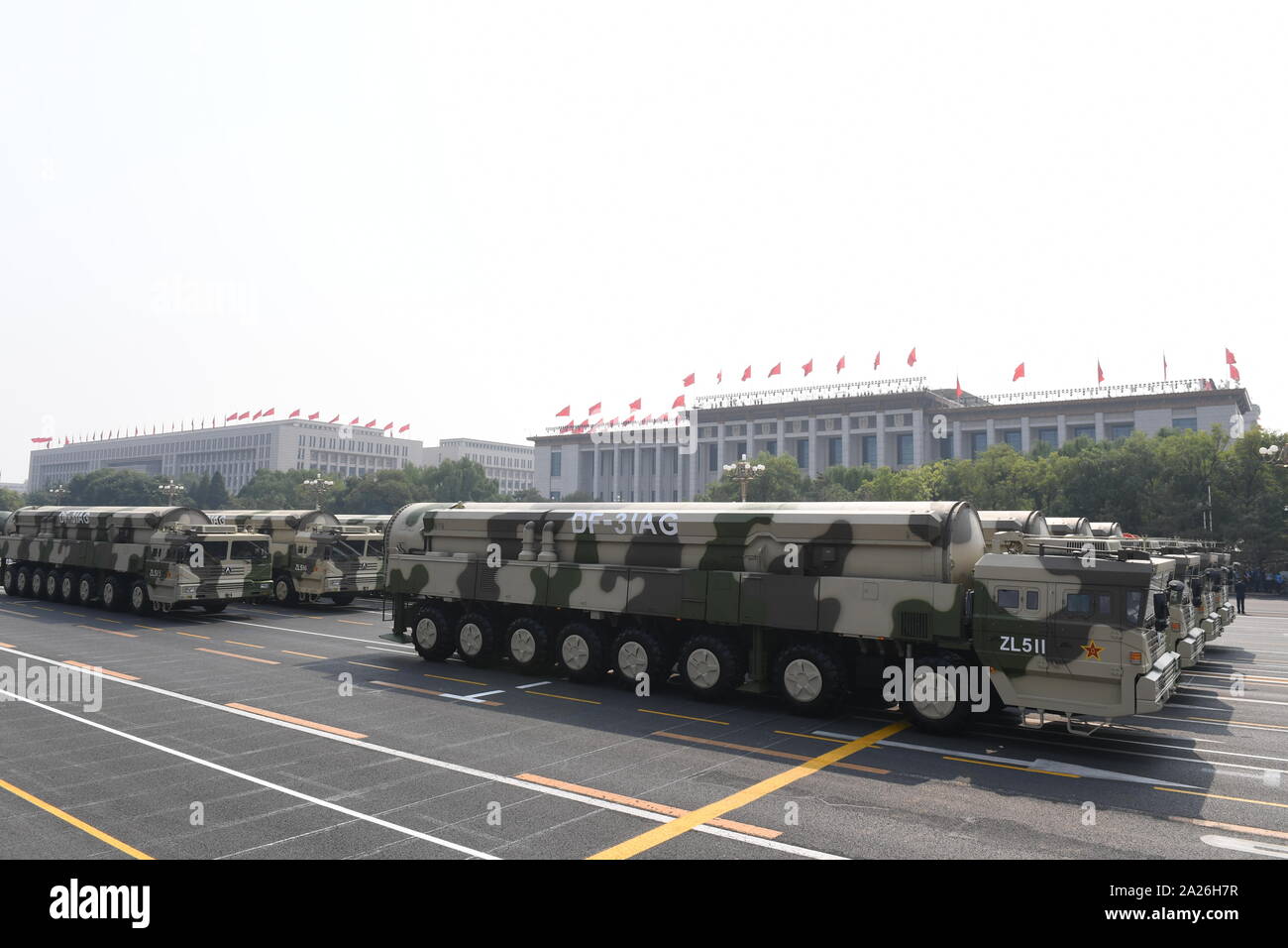 Beijing, China. 1st Oct, 2019. A formation of Dongfeng-31 ...