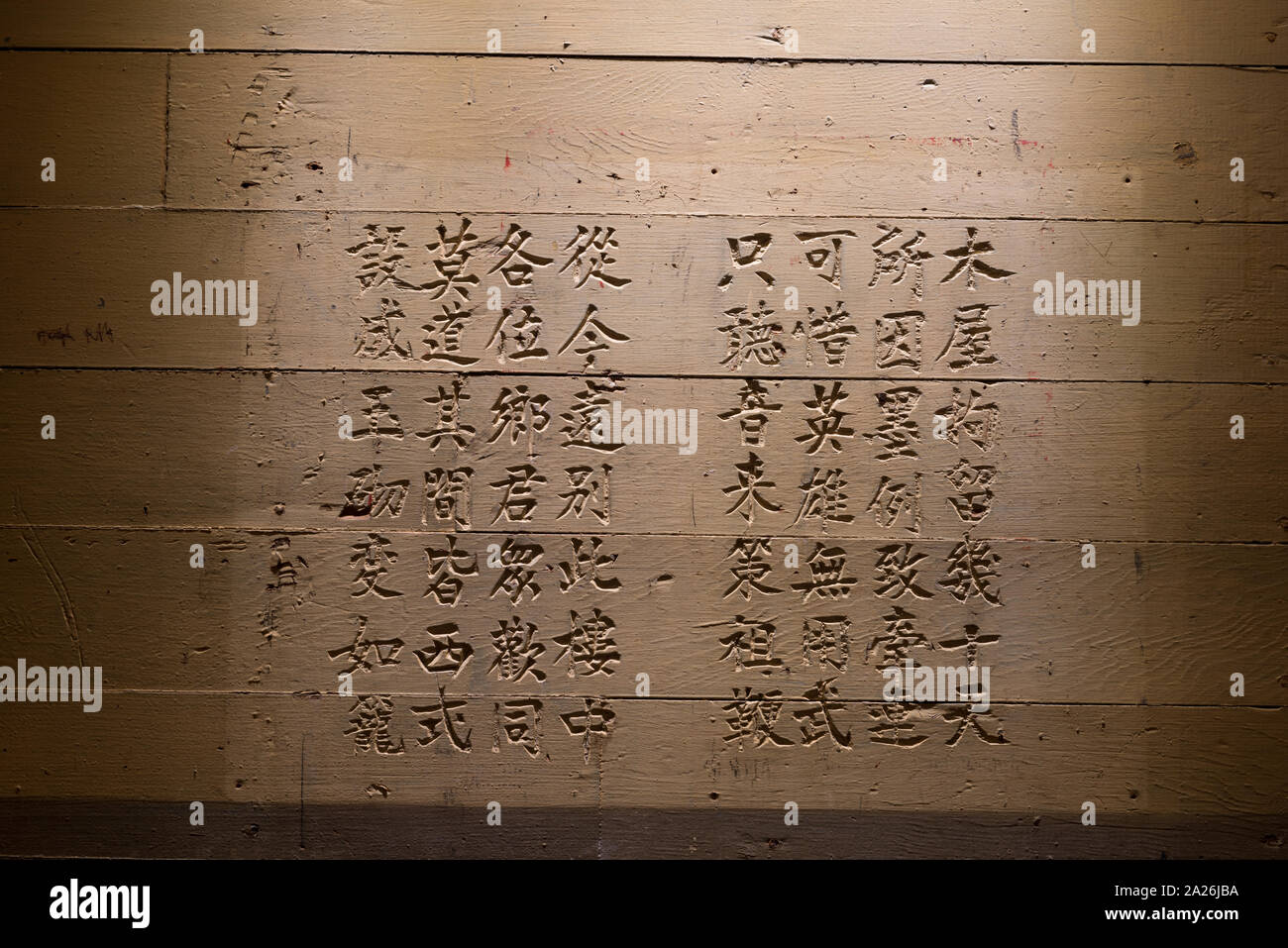 Poetic verse carved into the wall of the detention barracks at Angel ...