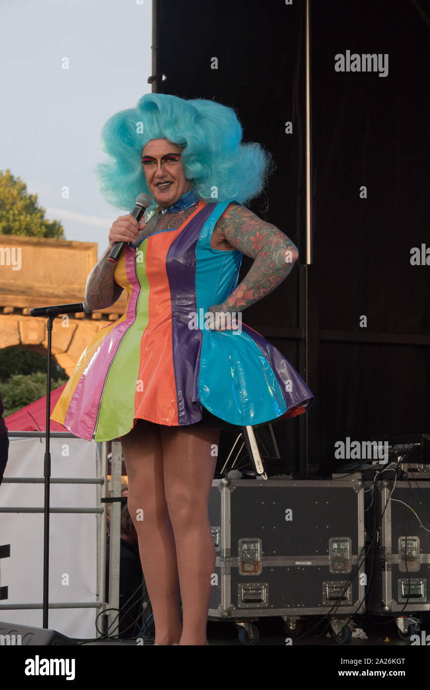Drag artist stage name "Shagger" with a huge blue wig and eccentric ...