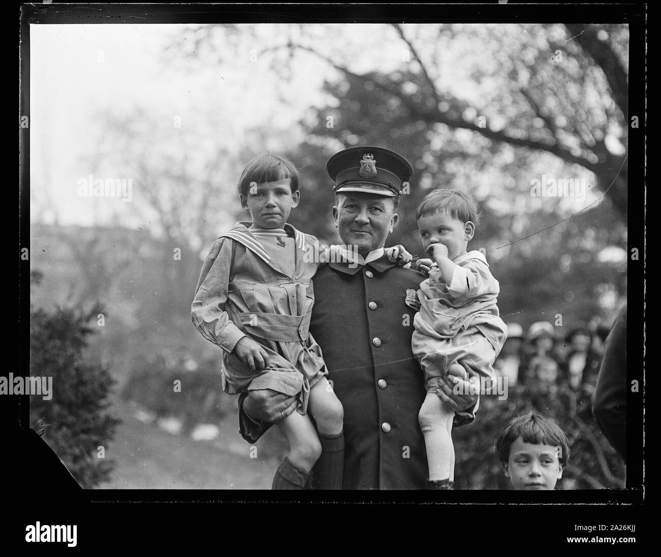 Officer holding Black and White Stock Photos & Images - Alamy