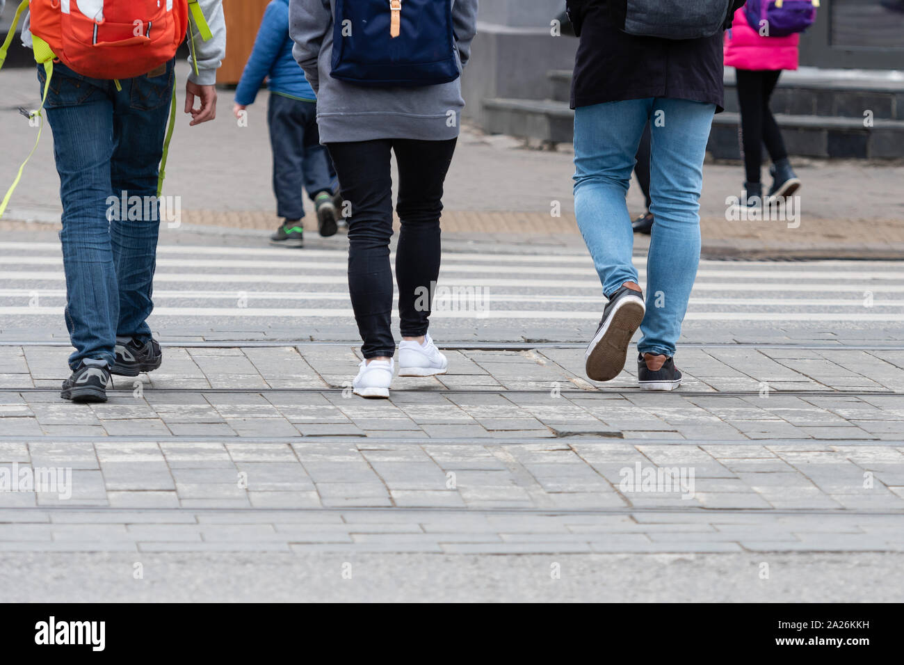 Group of feet walking on road hi-res stock photography and images - Alamy
