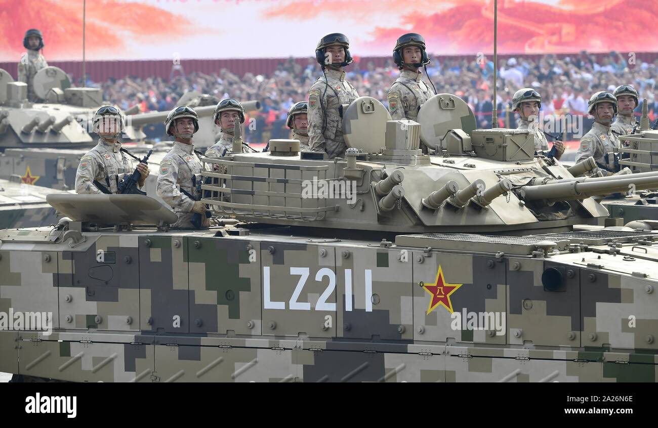 Beijing, China. 1st Oct, 2019. A formation of light armored vehicles ...