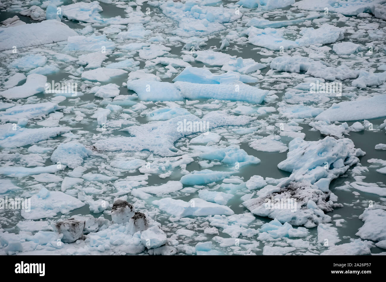 Huge pieces of broken ice floating Stock Photo - Alamy