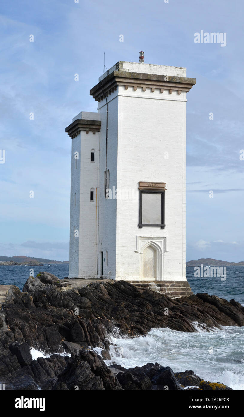 The lighthouse at Port Ellen on the coast at Carraig Fhada on the ...