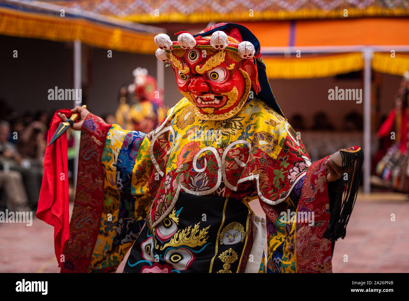 Monk performing a ritual dance in Takthok monastery, Ladakh Stock Photo ...