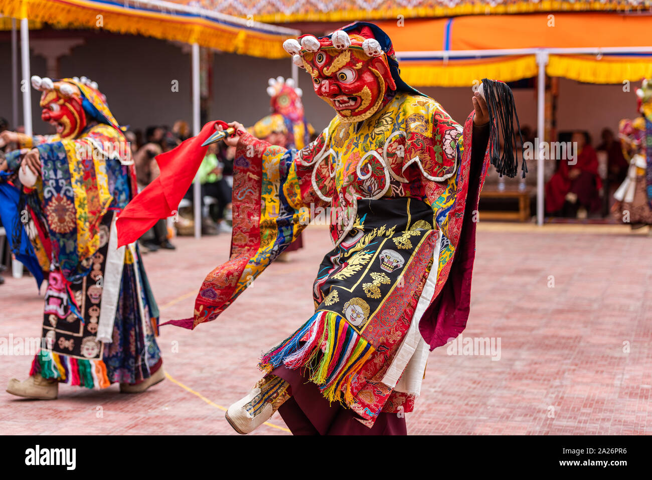 Monk performing a ritual dance in Takthok monastery, Ladakh Stock Photo ...