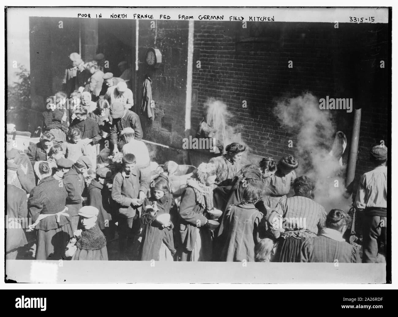 Poor in North France fed from German field kitchen Stock Photo - Alamy