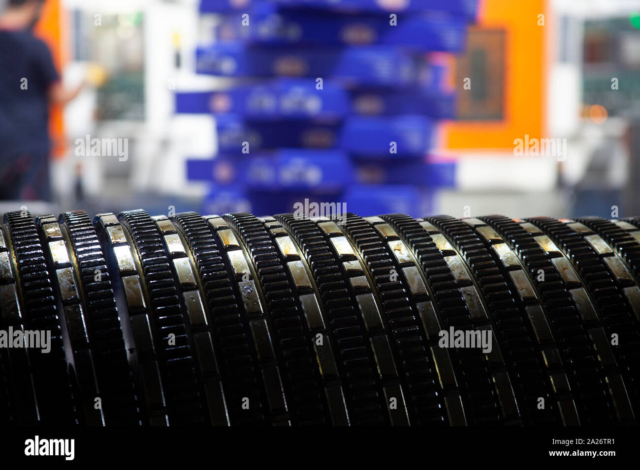 stacked steel pulleys inside factory Stock Photo - Alamy