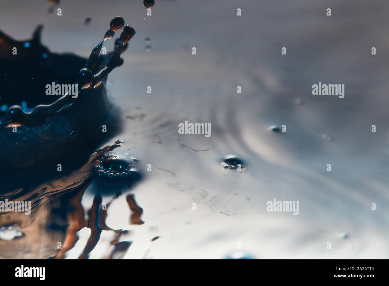 Oil drop splash shallow hi-res stock photography and images - Alamy