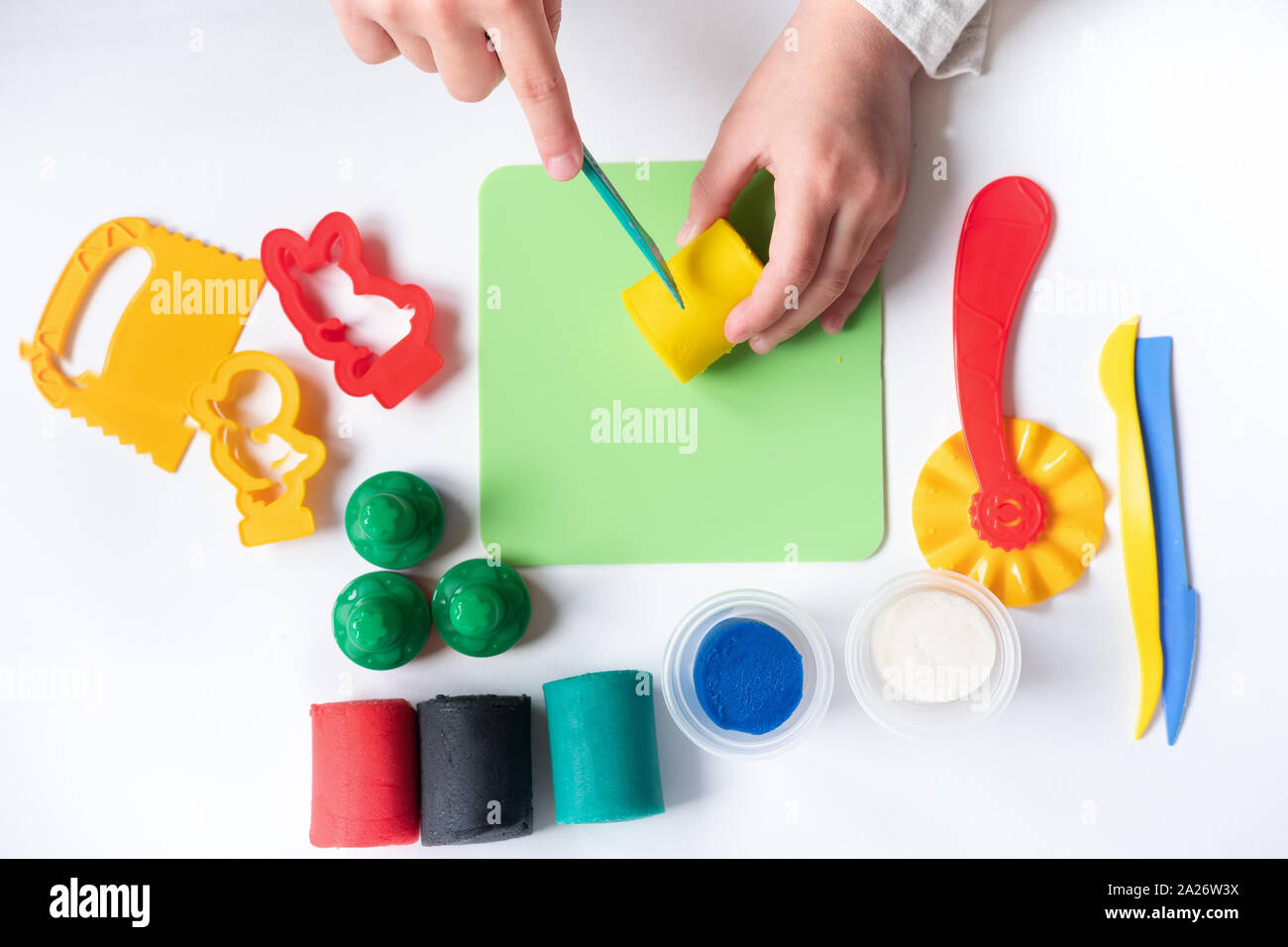 Child's hands sculpting clay figures Stock Photo - Alamy
