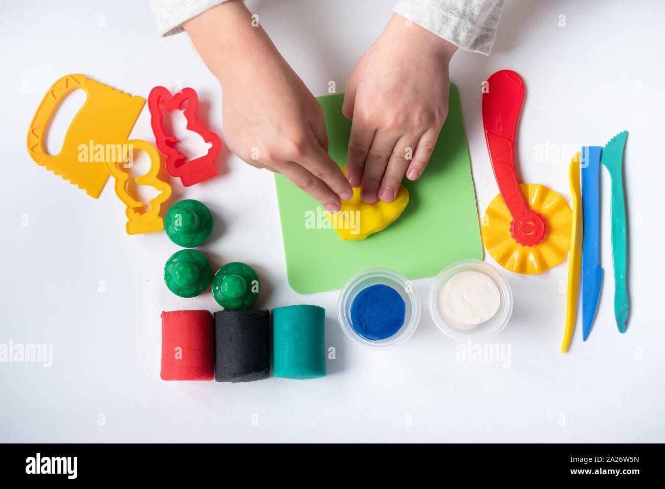 Child's hands sculpting clay figures Stock Photo - Alamy