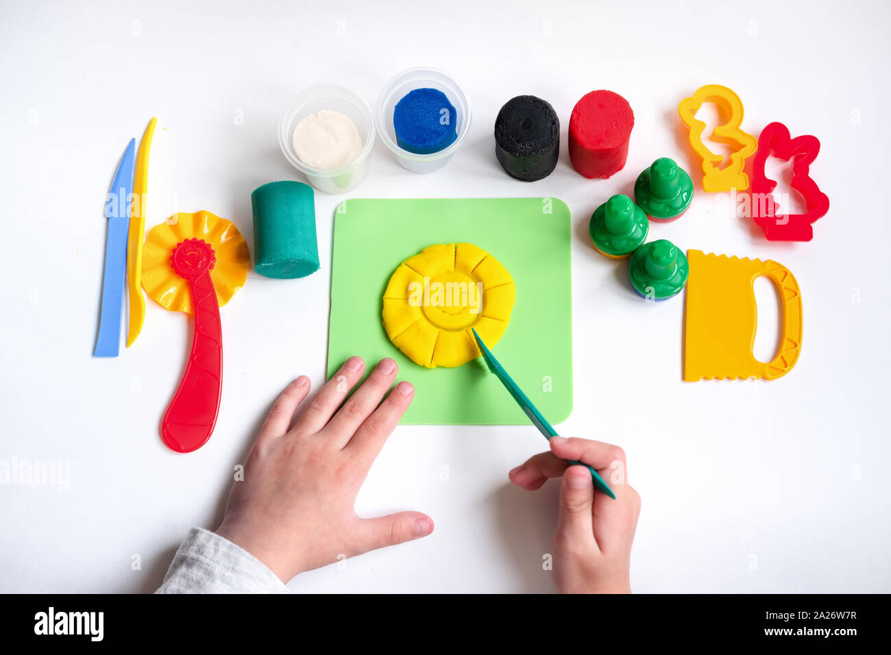 Child's hands sculpting clay figures Stock Photo - Alamy