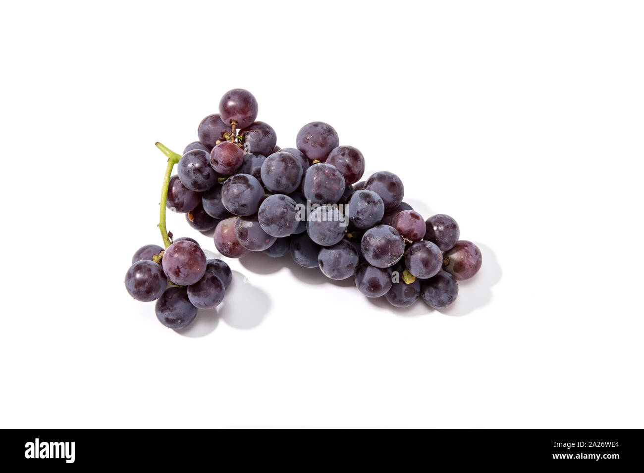 Fresh red grapes isolated on white background. Red Grapevine Stock ...
