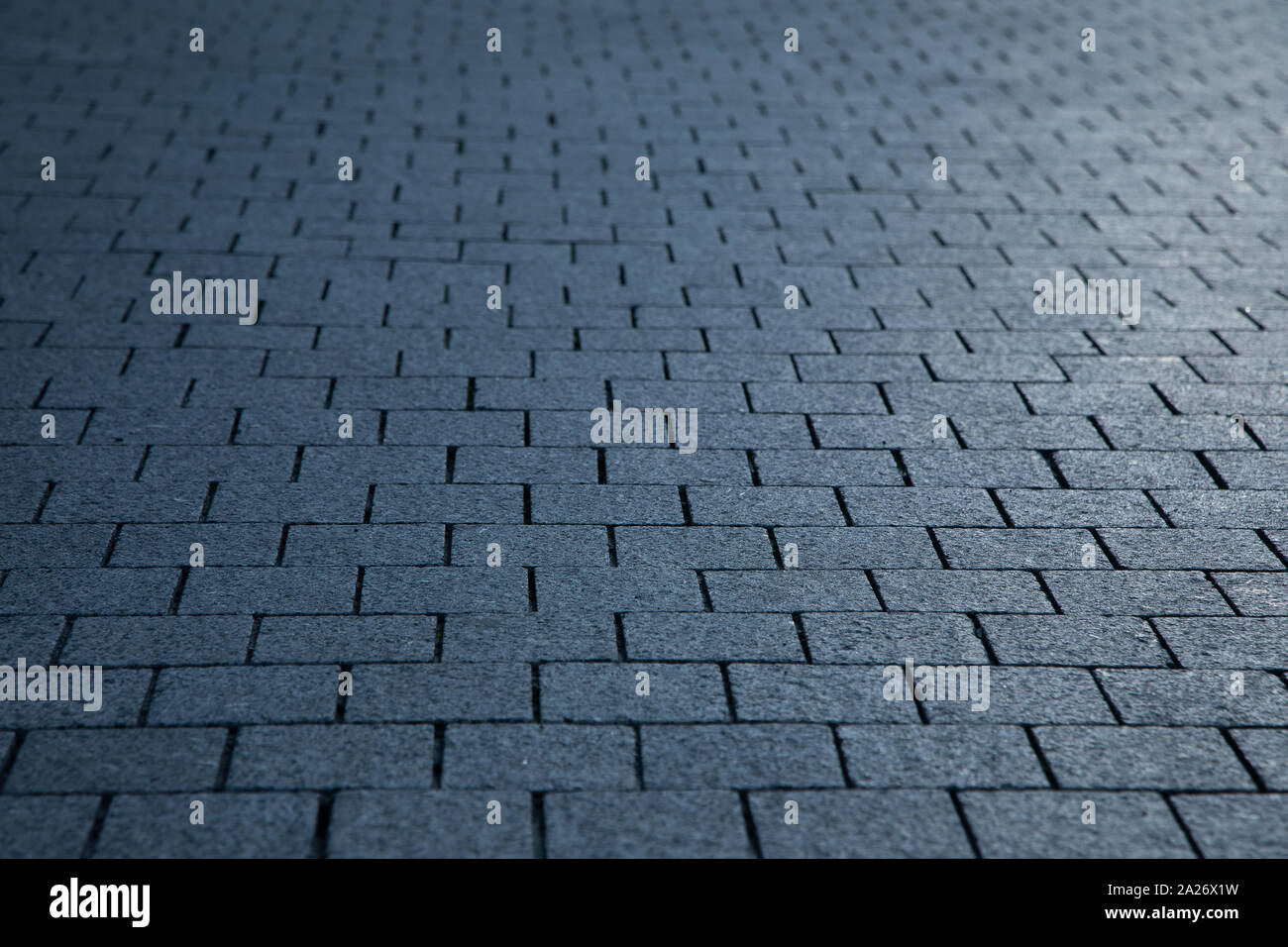 Dark grey granite rectangular pavement close-up texture background ...