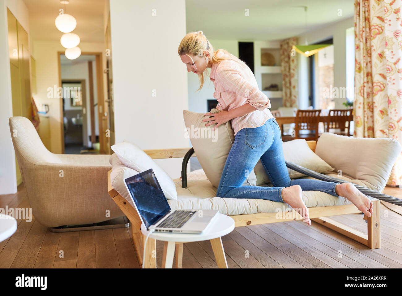 Cleaning lady sofa hi-res stock photography and images - Alamy