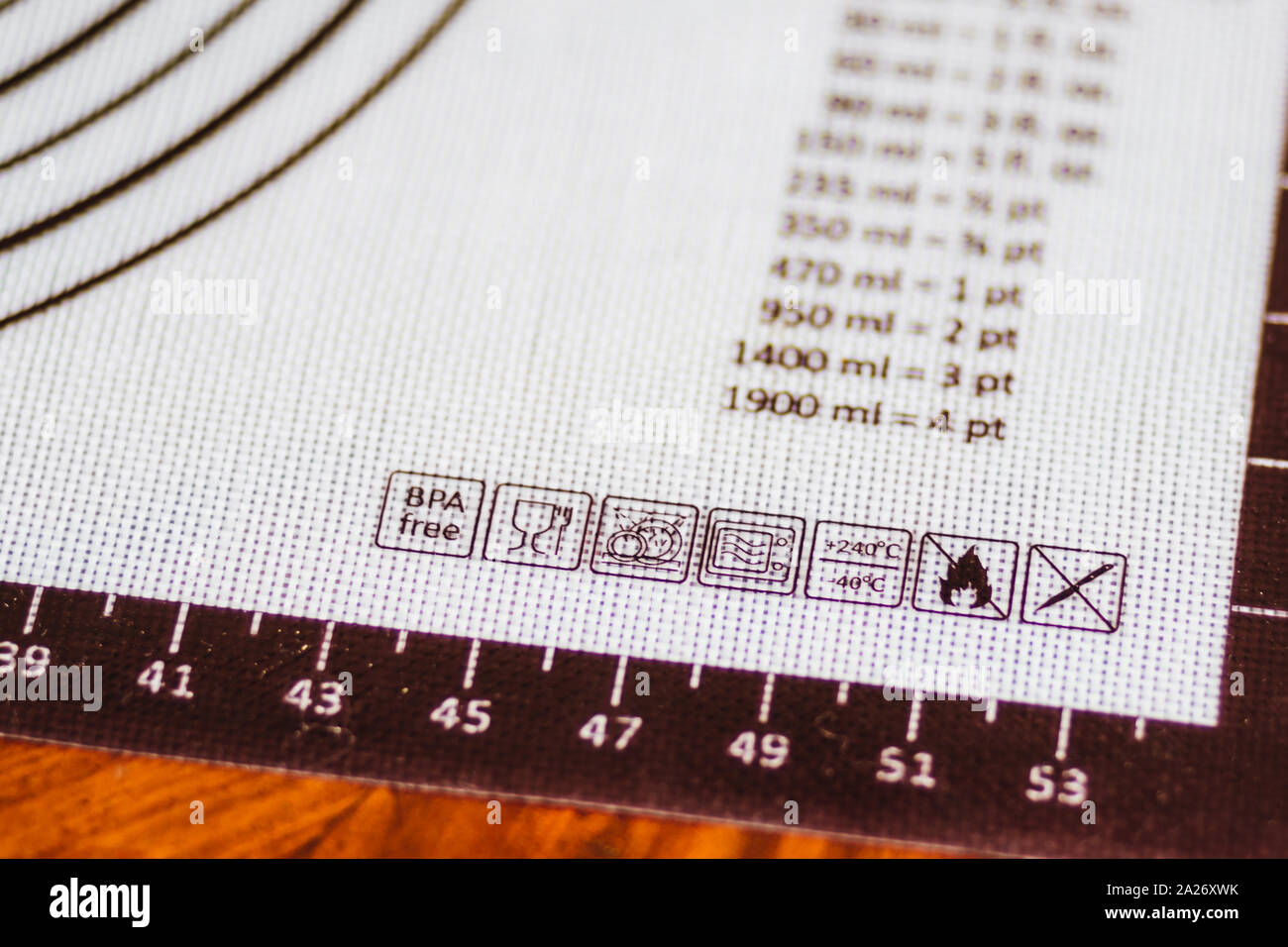 Silicone baking mat with scale of measurement. Tool for kitchen. German ...