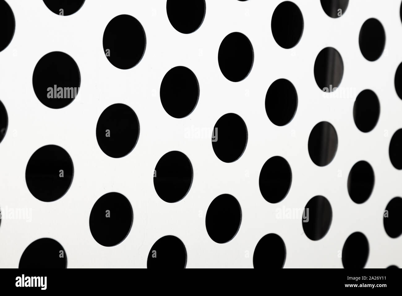 Rapid black big dot pattern on white background, round holes texture on ...