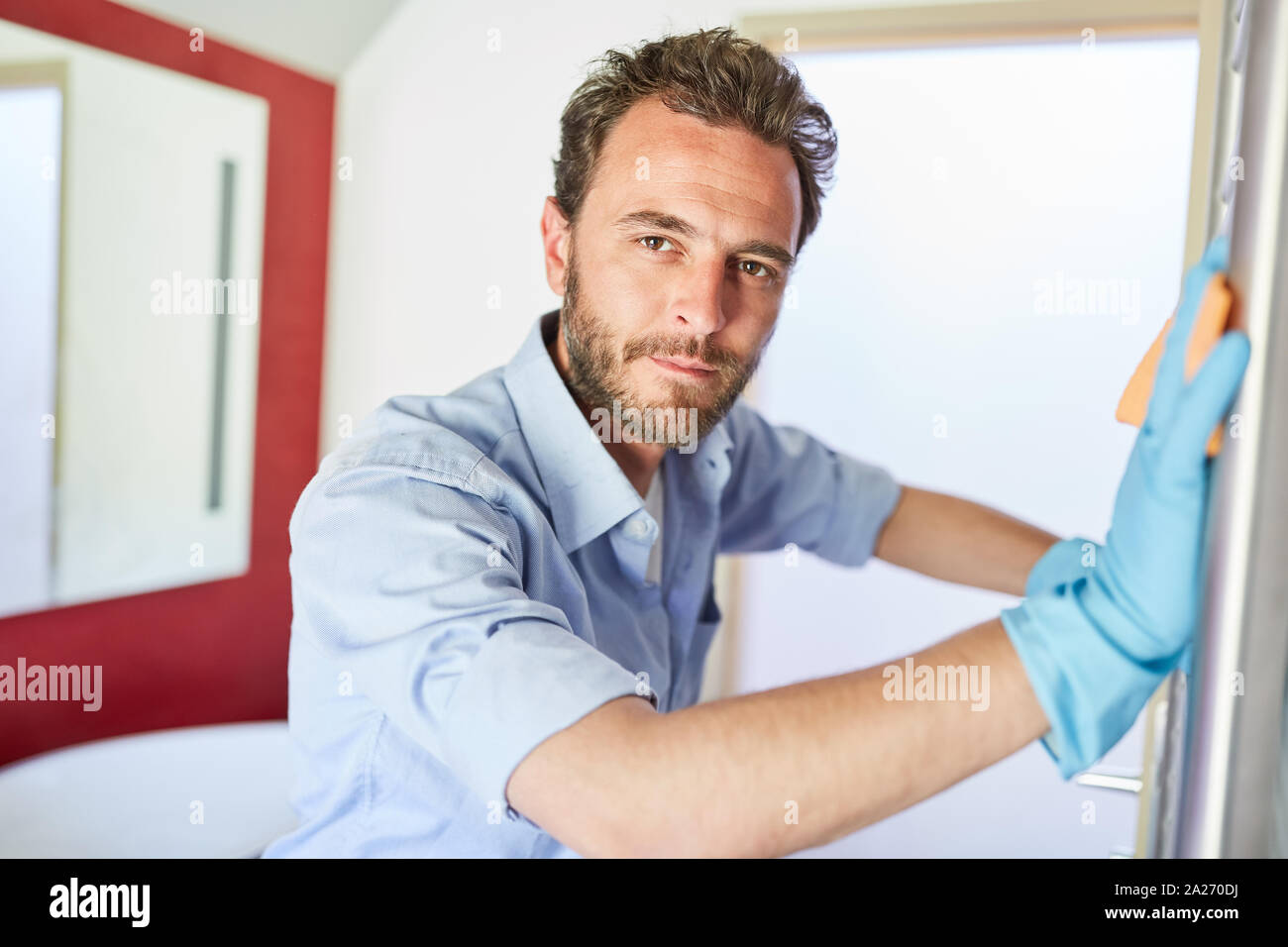 Man as housekeeper hi-res stock photography and images - Alamy