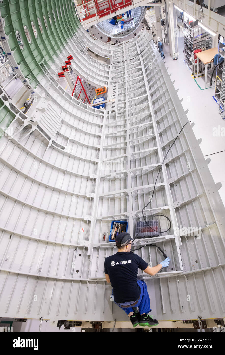 Hamburg, Germany. 01st Oct, 2019. An Airbus technician works in a ...