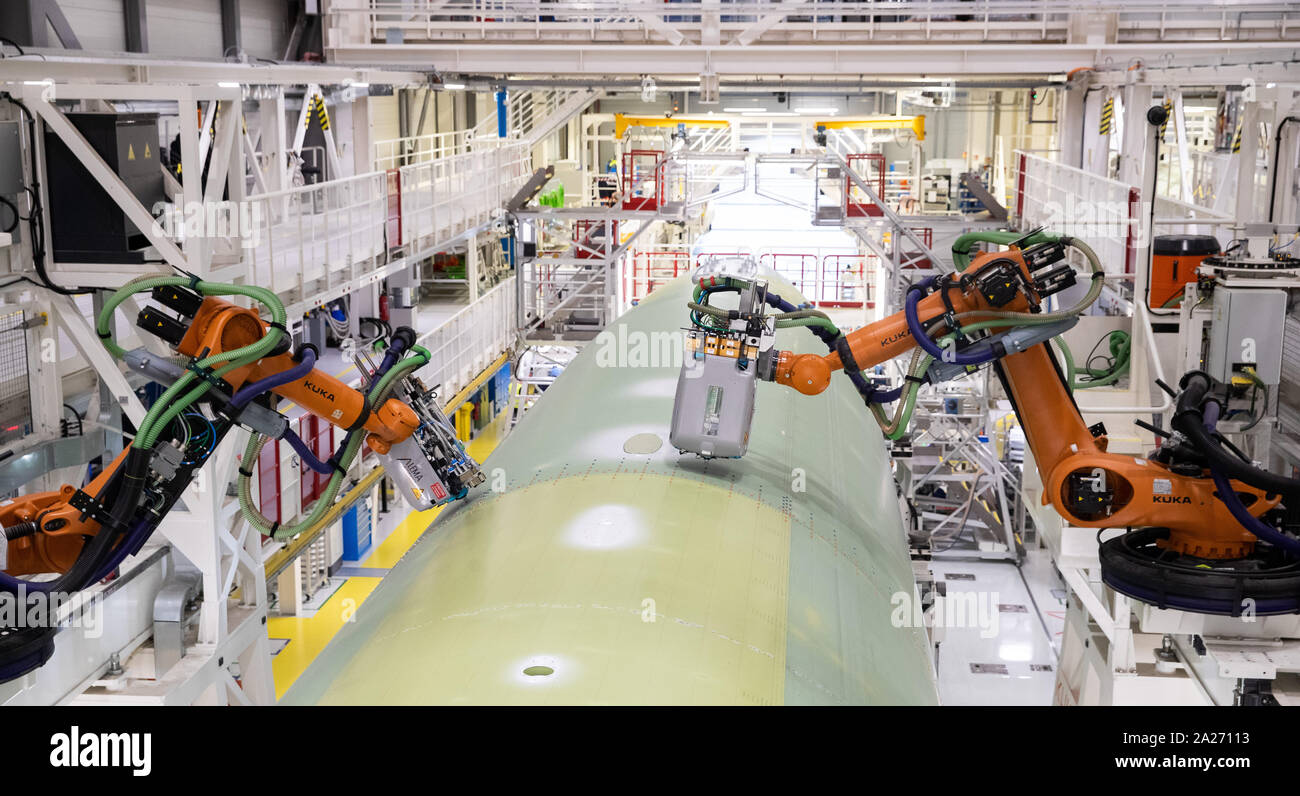 Hamburg, Germany. 01st Oct, 2019. Two robots drilling and setting ...