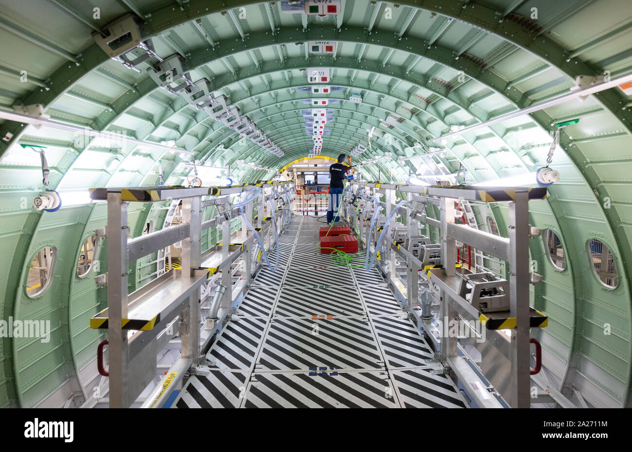 Hamburg, Germany. 01st Oct, 2019. An Airbus technician works in a ...