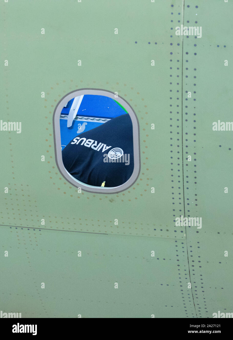 Hamburg, Germany. 01st Oct, 2019. Through an aircraft window, an Airbus ...