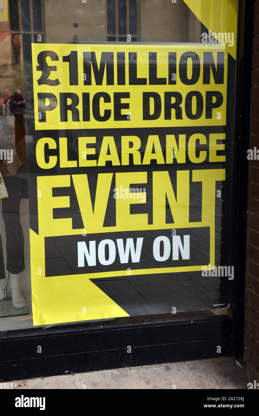 A sign advertising a £1 million clearance event at Beales department ...