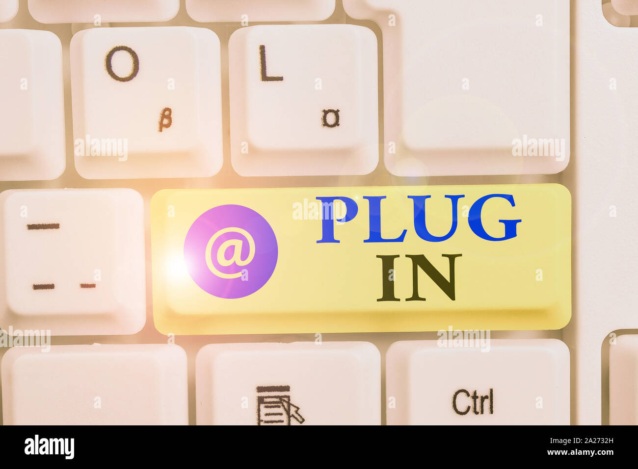 Writing note showing Plug In. Business concept for putting device into electricity to turn it on ...