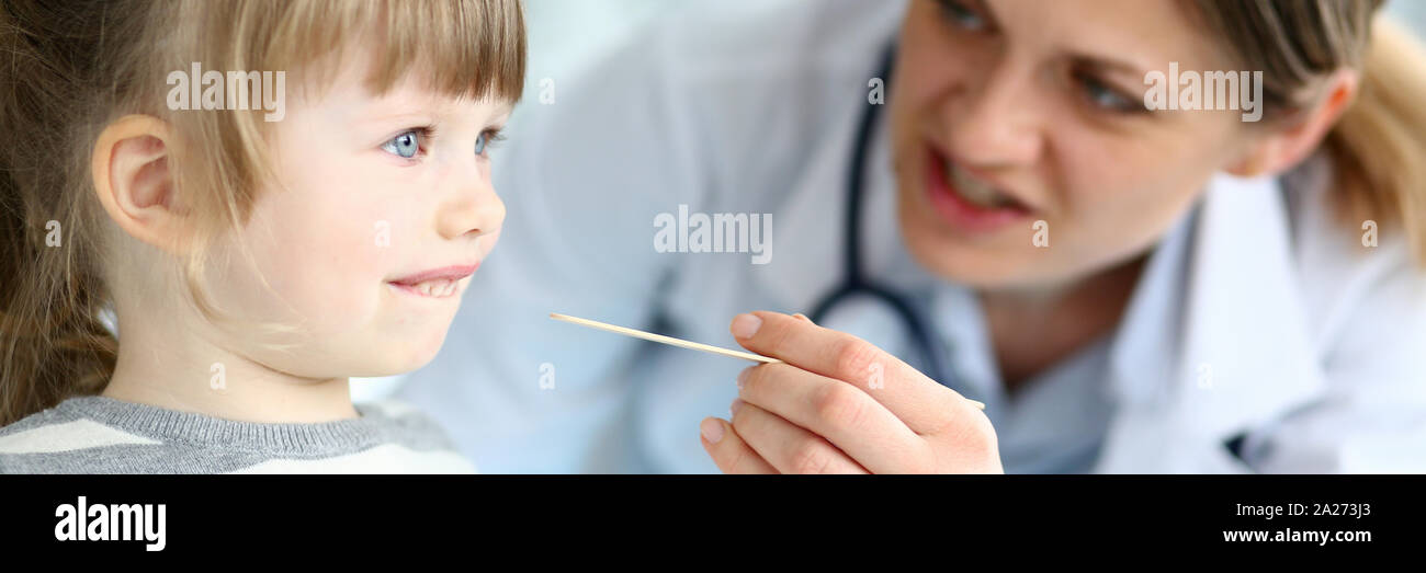 Smart female doctor and child Stock Photo - Alamy