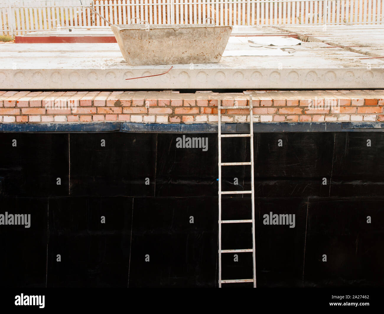 Ladder leaning against building hi-res stock photography and images - Alamy