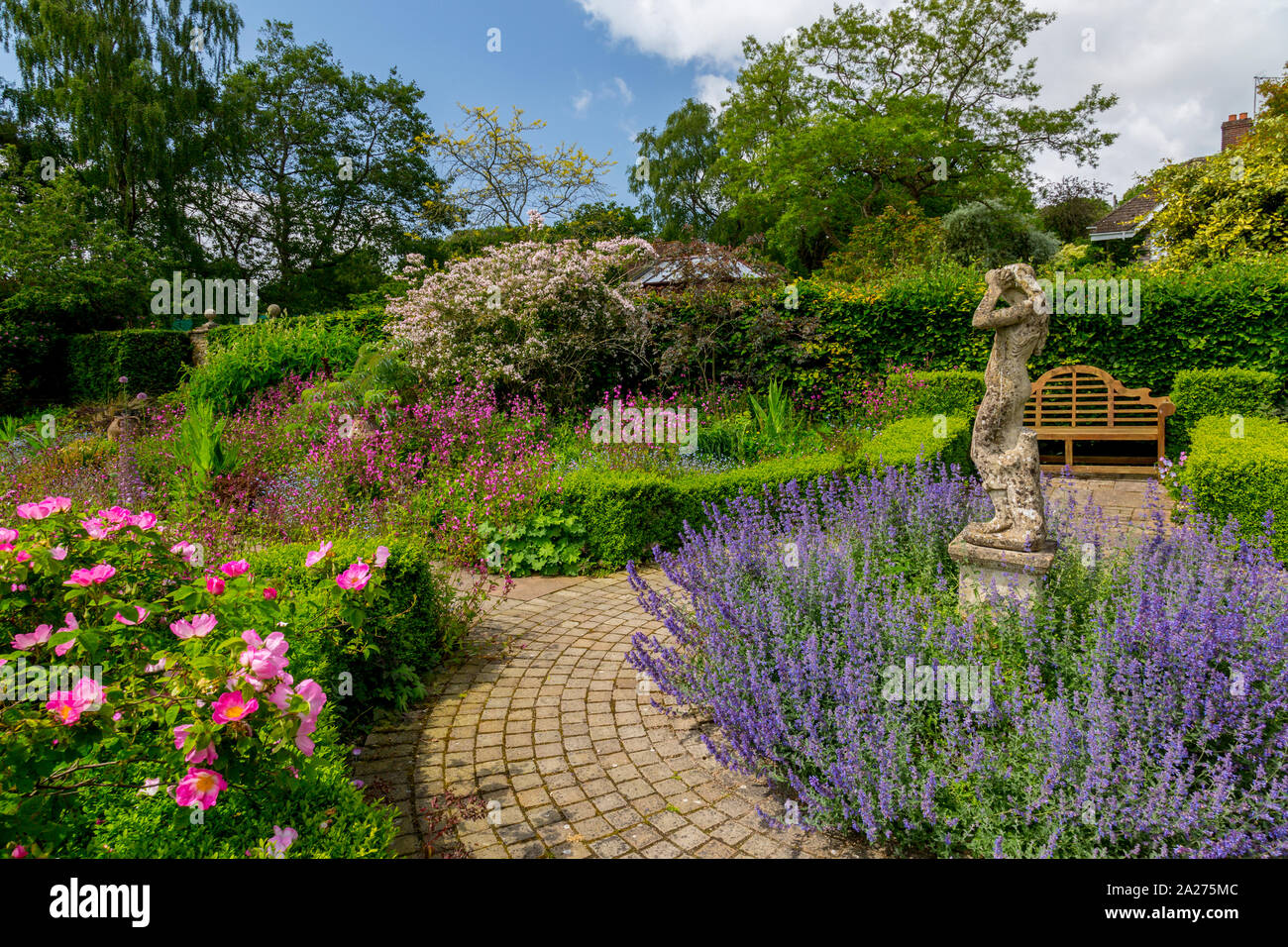 The beds of the Rose Garden are filled with a colourful variety of ...