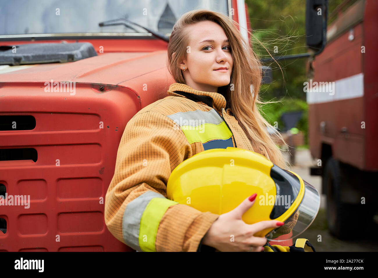 Fireman girl model hi-res stock photography and images - Alamy
